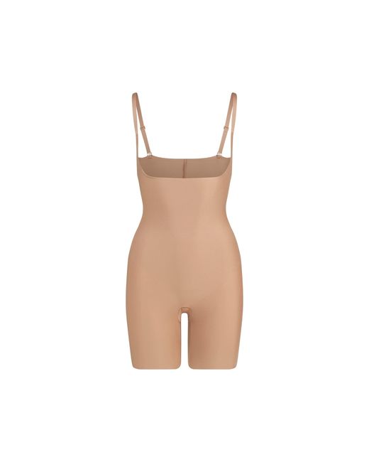 Skims Core Sculpt Open Bust Mid Thigh Bodysuit in White | Lyst