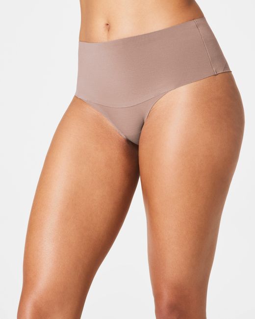 Spanx Supersmoothtm Undie-tectable® Modal Tanga in Natural | Lyst