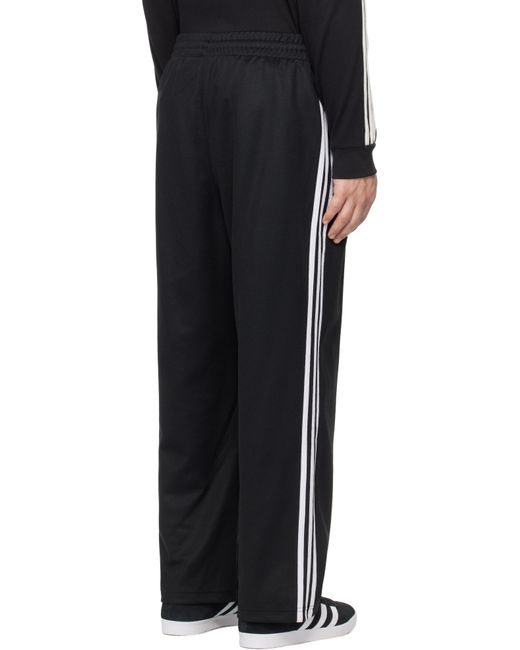 adidas Originals Adicolor Baggy Fit Firebird Track Pants in Black for Men | Lyst