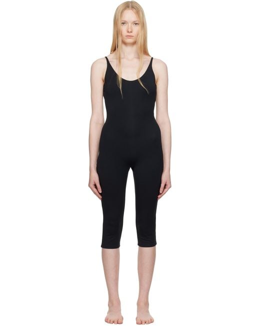 Skims Smooth Layers Capri Catsuit in Black | Lyst