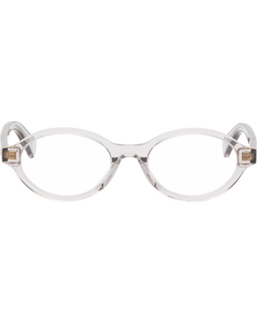 Bottega Veneta Transparent Triangle Stud Logo Round Glasses in Black | Lyst