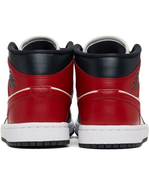 Nike Air Jordan 1 Mid Sneakers in Black | Lyst