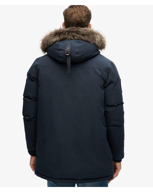 Superdry Loose Fit Embroidered Logo Everest Faux Fur Parka Jacket in ...