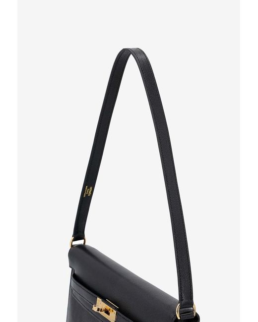 Hermès Kelly Elan In Black Chevre Leather With Gold Hardware in White ...