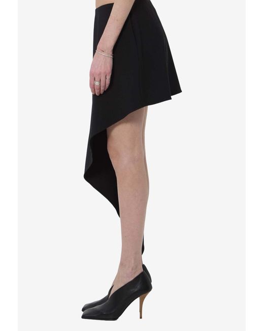 Alaïa Asymmetric Pointed Midi Skirt in Black | Lyst