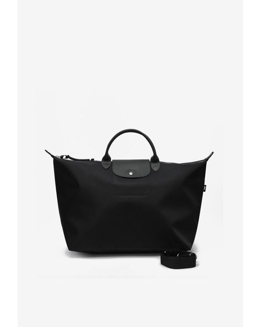 Longchamp Small Le Pliage Energy Top Handle Bag in Black | Lyst