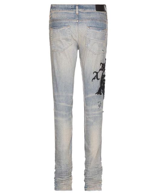 Amiri Wes Lang Reaper Logo Clay Jeans in Blue for Men | Lyst