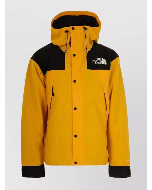 The North Face Waterproof Hooded Jacket in Yellow for Men | Lyst UK