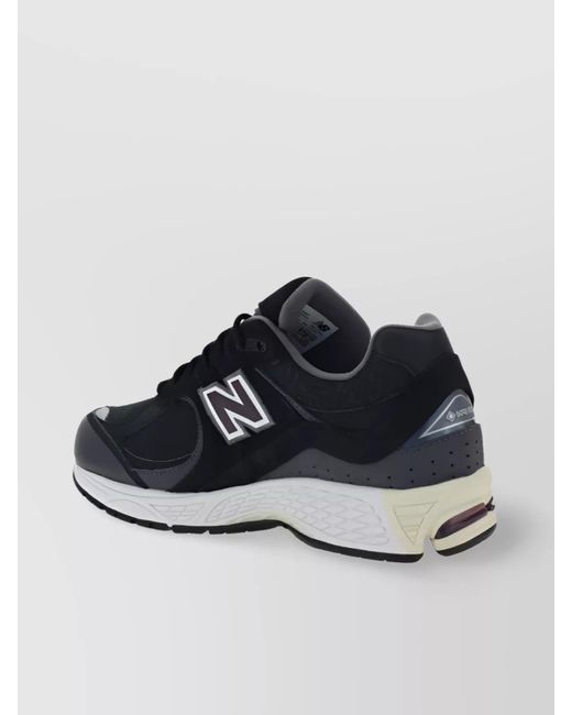 New Balance Logoed Front Tab Sneakers With Mesh Panels in Blue for Men ...