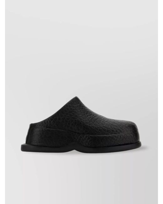 McQueen Wave Leather Slides Round Toe in Black | Lyst UK