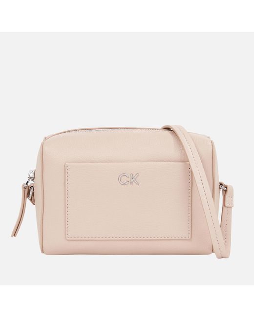 Calvin Klein Ck Daily Pebble-grain Faux Leather Camera Bag in Natural ...