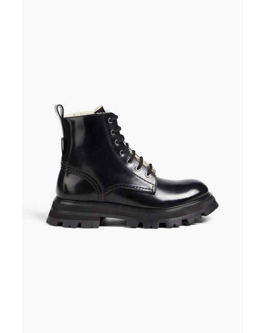 McQueen Wander Glossed-Leather Combat Boots in Black | Lyst