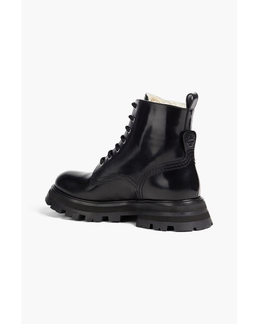 McQueen Wander Glossed-Leather Combat Boots in Black | Lyst