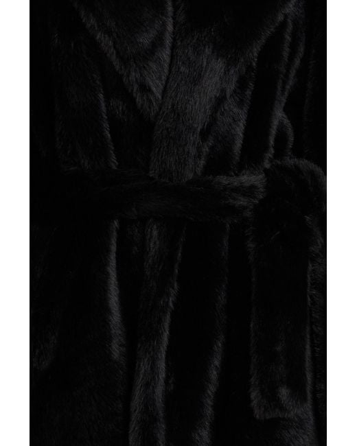 Sandro Faux Fur Coat in Black | Lyst UK