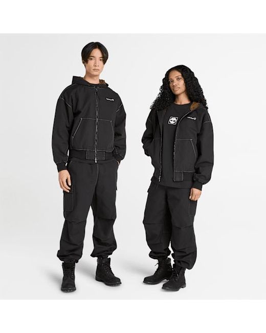 Timberland All Gender Washed Duck Canvas Hooded Bomber in Black | Lyst UK