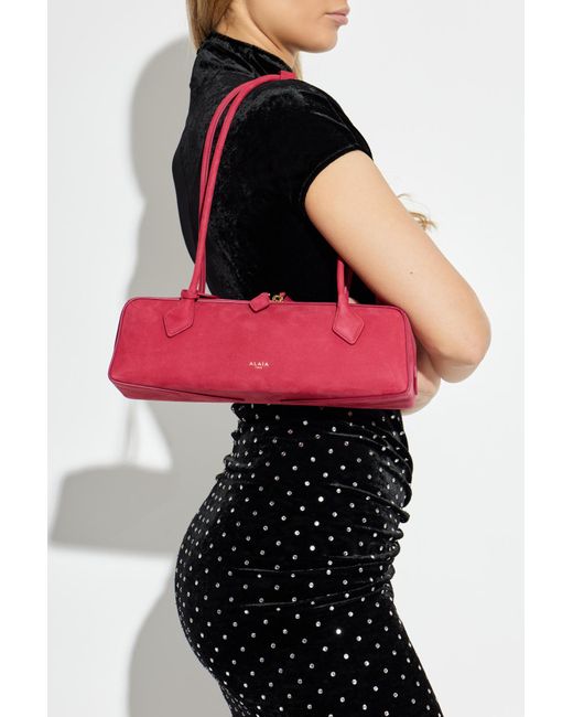 Alaïa Shoulder Bag "Le E Teckel Medium" in Pink | Lyst UK