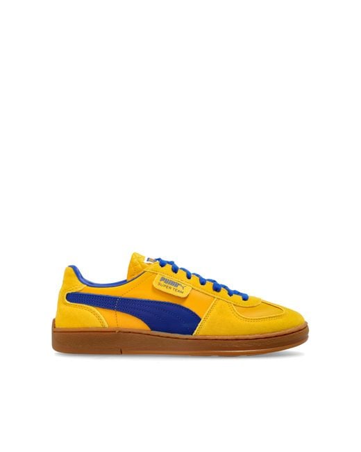PUMA Sports Shoes Super Team Parma in Yellow | Lyst UK