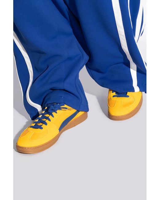 PUMA Sports Shoes Super Team Parma in Yellow | Lyst UK