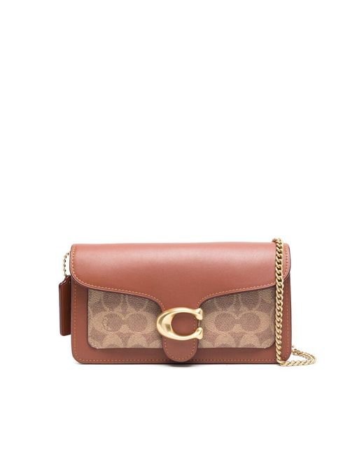 COACH Neutral Clutch Bags in Pink | Lyst