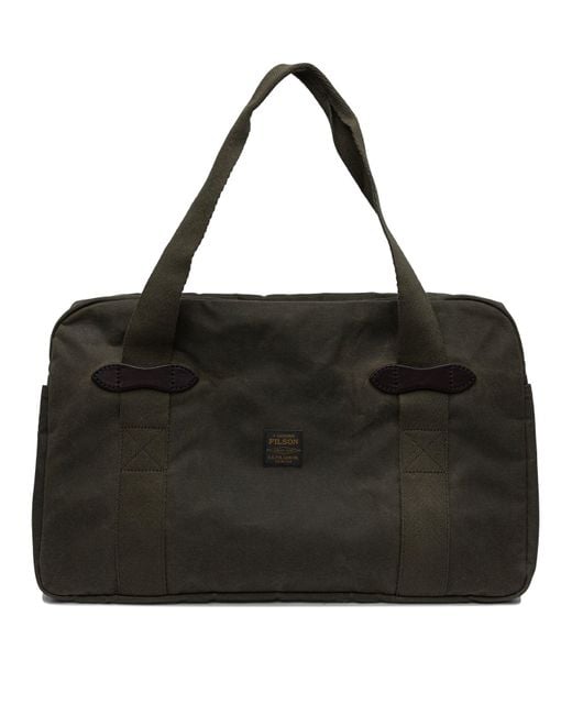 Filson Tin Cloth Medium Duffle Bag in Black for Men | Lyst UK