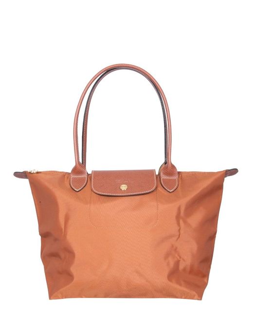 Longchamp Le Pliage Medium Bag in Brown | Lyst UK