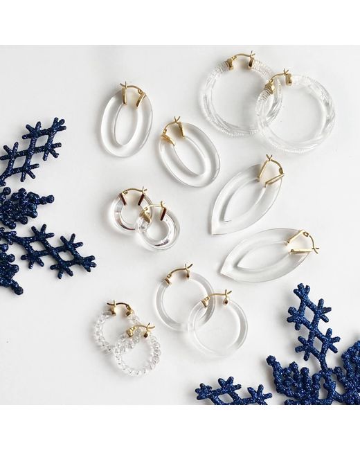 Gold & Honey Clear Flat Oval Hoops in Metallic | Lyst UK