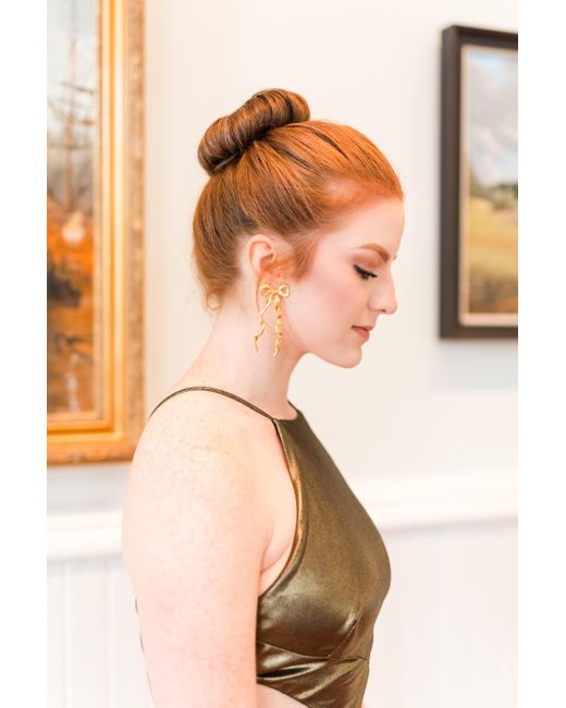 The Pink Reef Elongated Bow in Metallic | Lyst UK