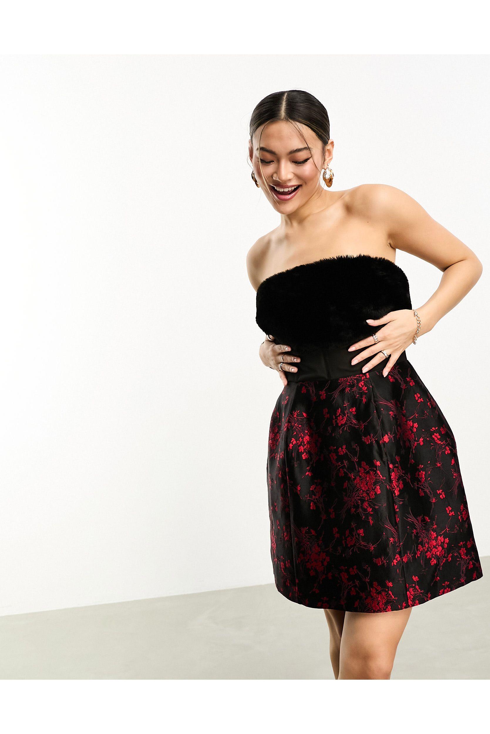 Robe courte avec buste en fausse fourrure et jupe corsetée effet cage - à fleurs rouges ASOS en ...