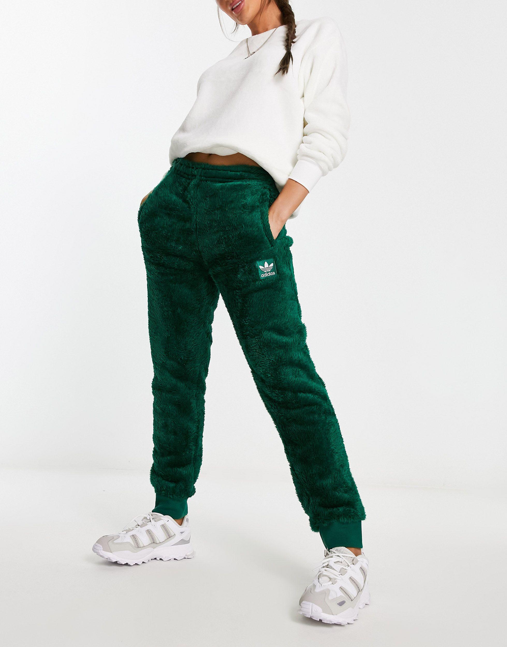 adidas Originals Essentials Fleece joggers in Green | Lyst UK