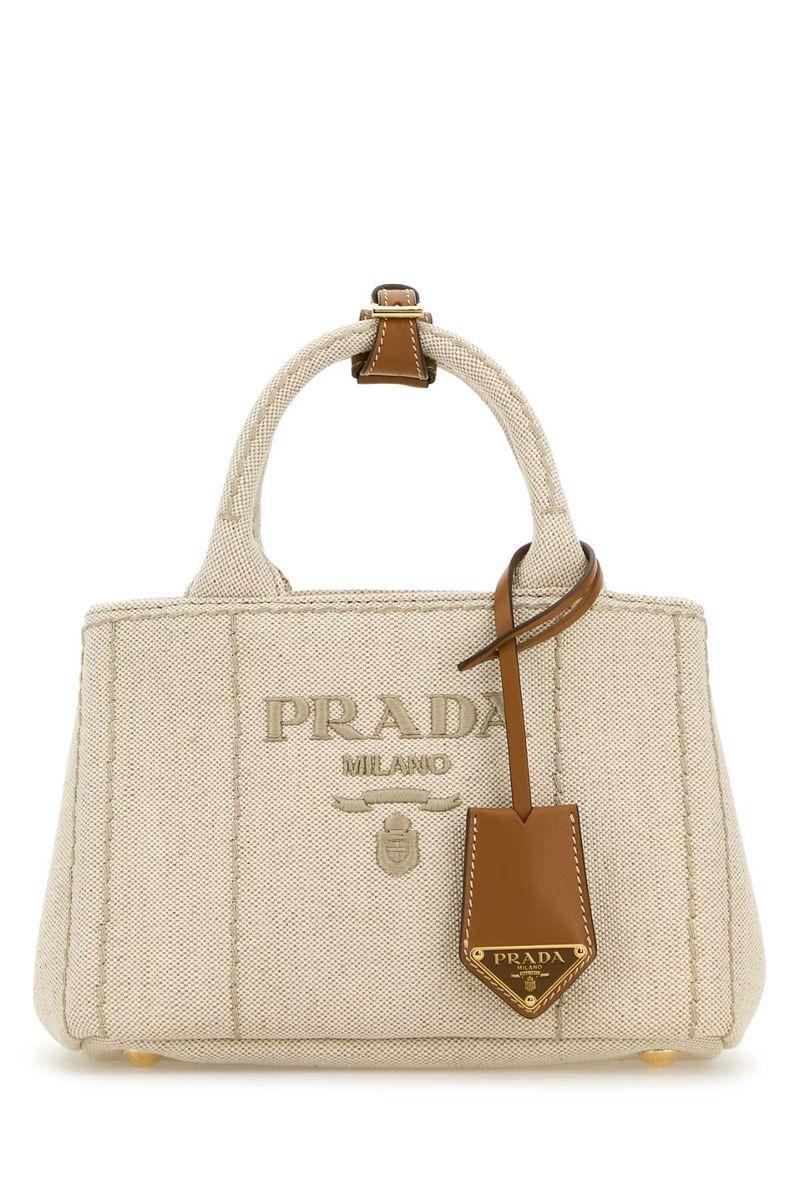 Prada Handbags in Natural | Lyst