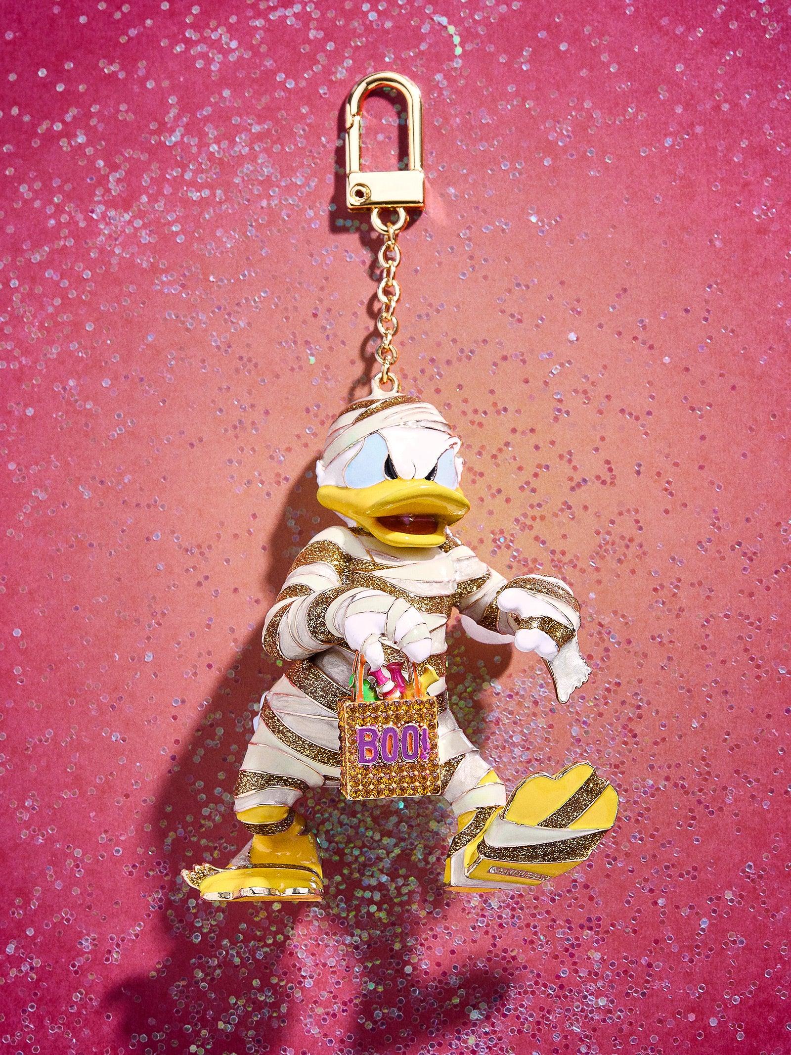 BaubleBar Donald Duck Disney Mummy Glow-in-the-dark Bag Charm in Pink ...