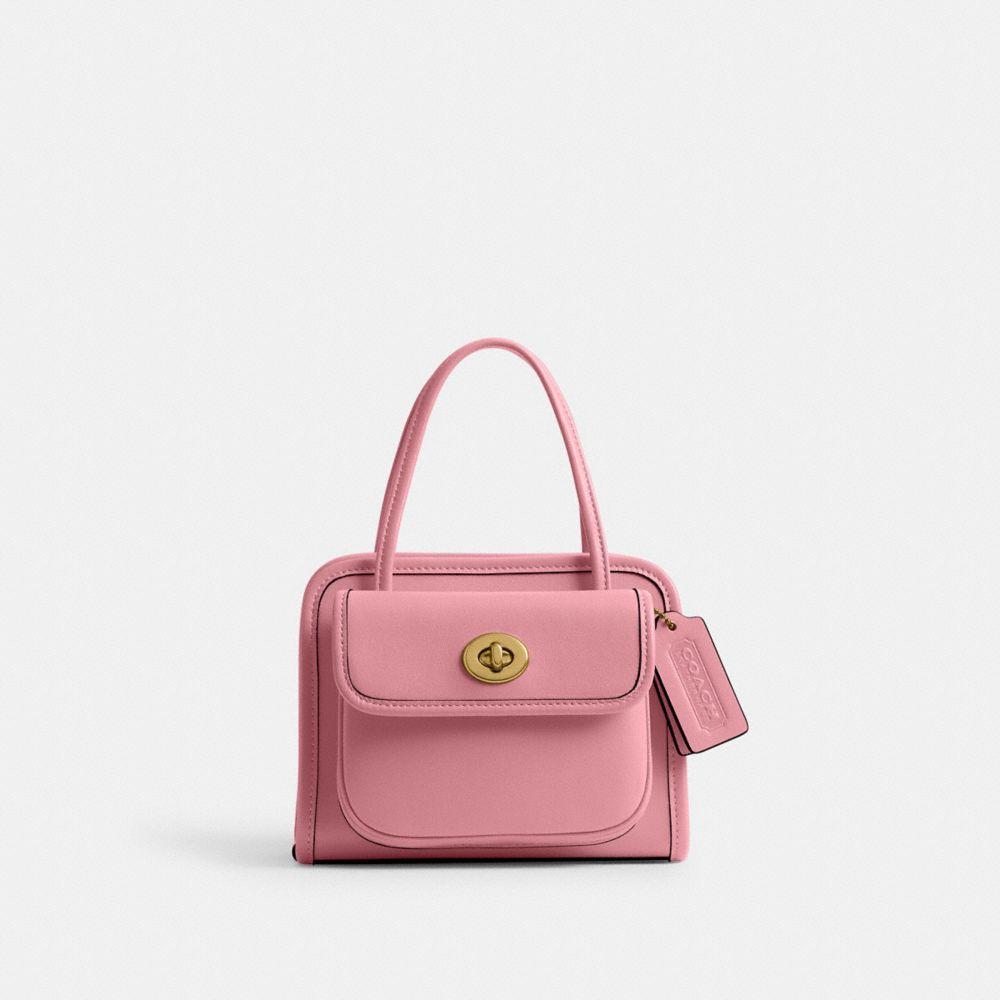 COACH Safari Bag in Pink | Lyst
