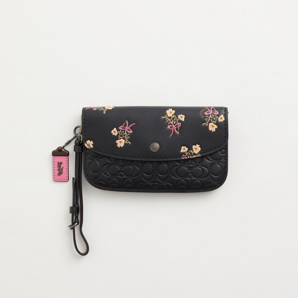 COACH Restored Clutch In Signature Leather With Floral Bow Print in ...