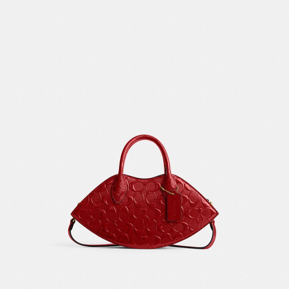 COACH Lip Bag In Signature Leather in Red | Lyst