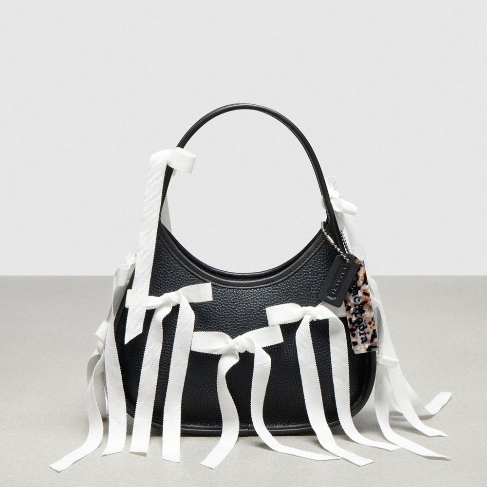 COACH Ergo Bag In Topia Leather With Allover Bows in Black | Lyst