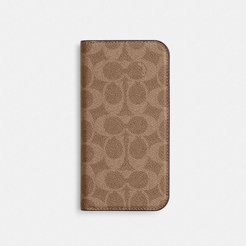COACH Iphone 16 Pro Folio In Signature Canvas in Brown | Lyst