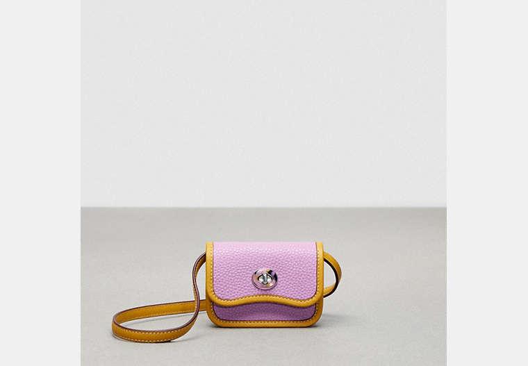 COACH Wavy Wallet With Crossbody Strap in Pink | Lyst