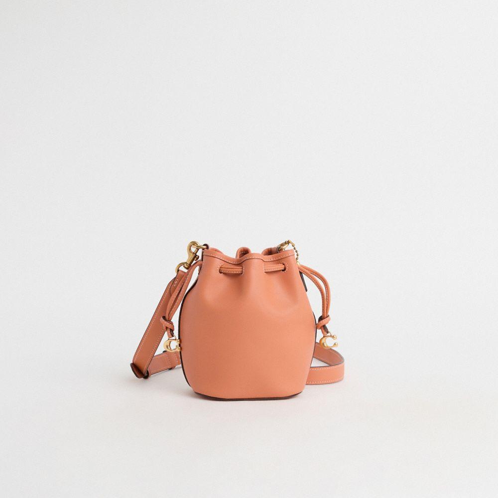 COACH Restored Camila Bucket Bag in Orange | Lyst