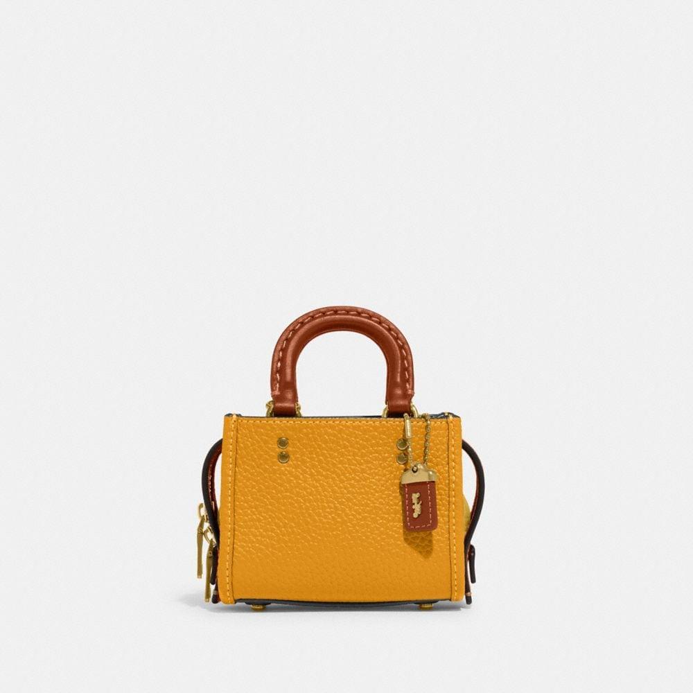 COACH Rogue 12 In Colorblock Regenerative Leather in Orange | Lyst