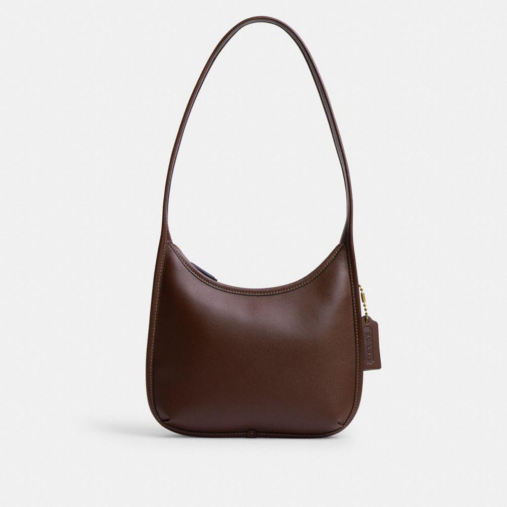 COACH Curve Zip Bag in Brown | Lyst