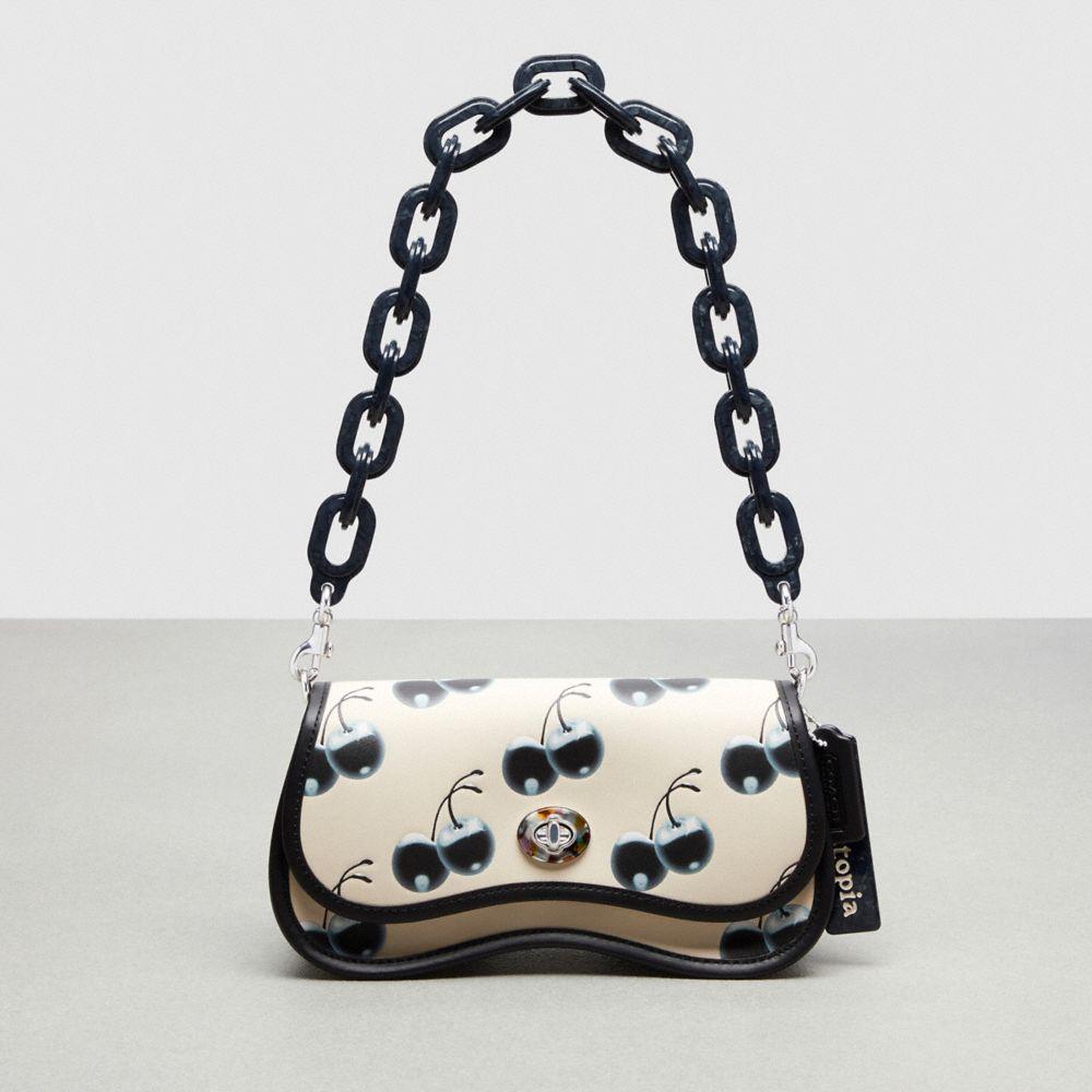 COACH Wavy Dinky Bag In Topia Leather Cherry Print in Black | Lyst