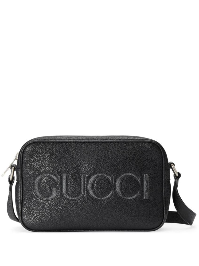 Gucci Engraved Logo Leather Zip Crossbody in Black for Men | Lyst