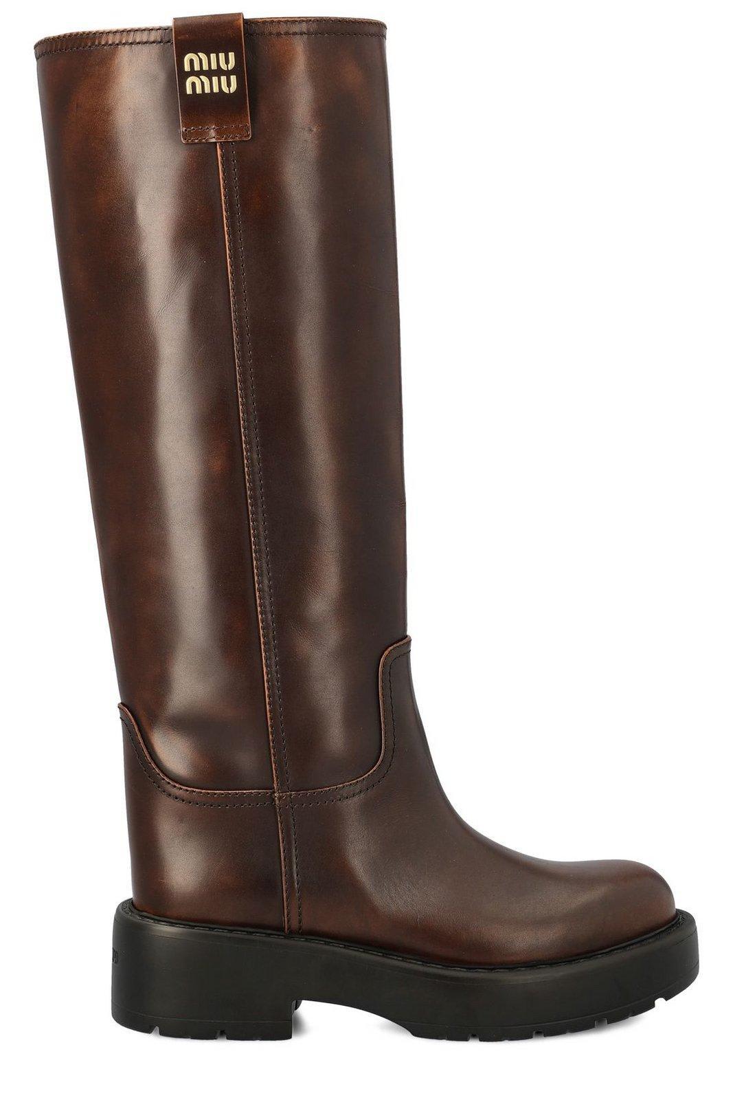 Miu Miu Logo-Detailed Slip-On Boots in Brown | Lyst