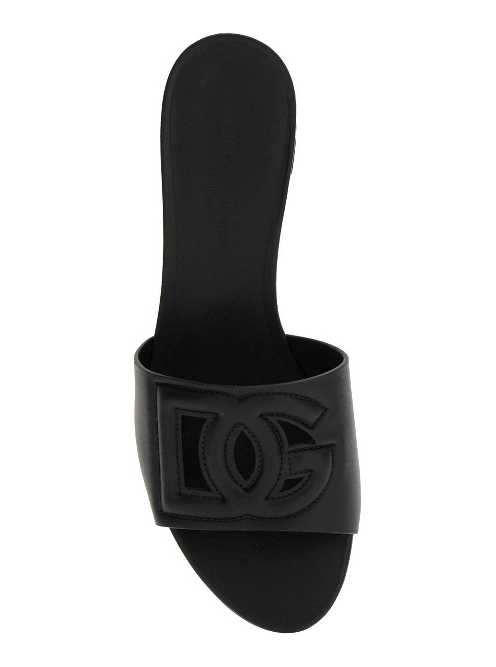 Dolce & Gabbana Slides With Low Heel And Logo Dg in Black | Lyst