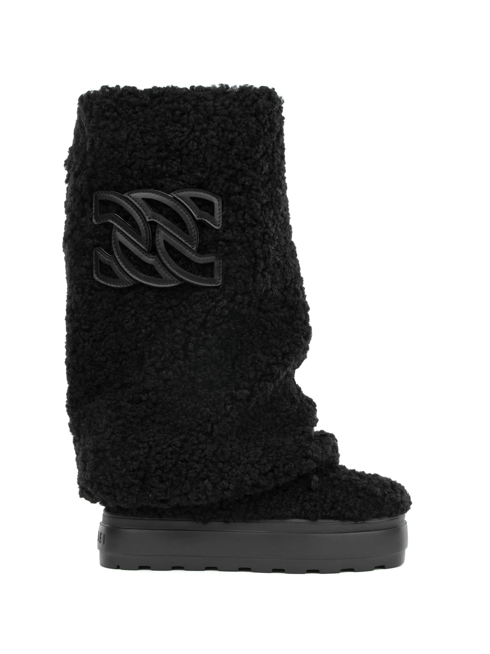 Casadei Teddy Wedge Boot in Black | Lyst