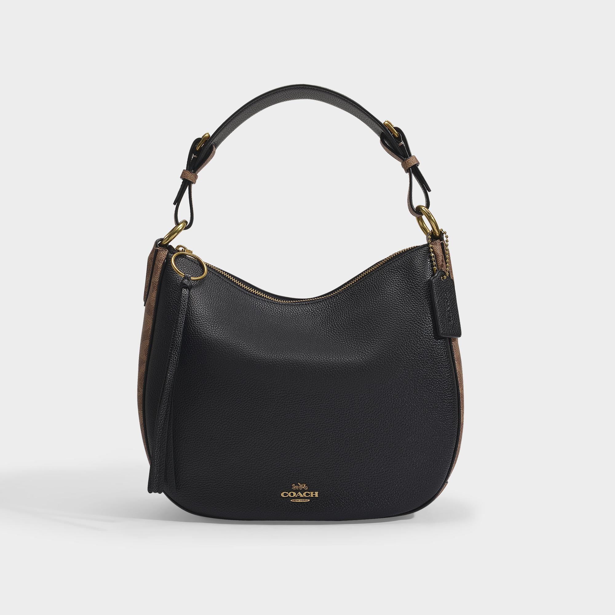 Coach Ladies Signature Canvas Sutton Hobo Bag | IUCN Water