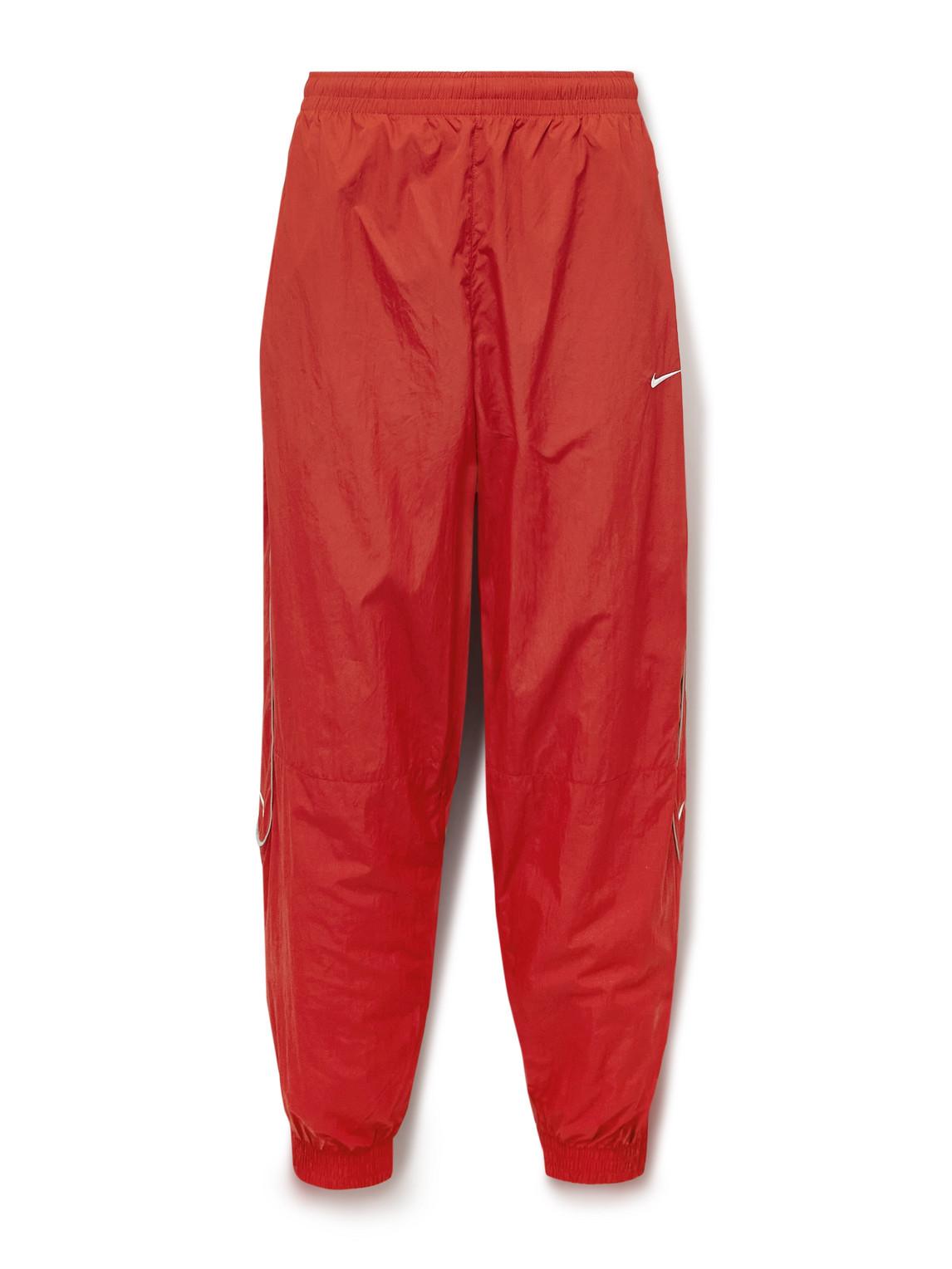 Nike Solo Swoosh Tapered Logo-embroidered Taffeta Track Pants for Men ...