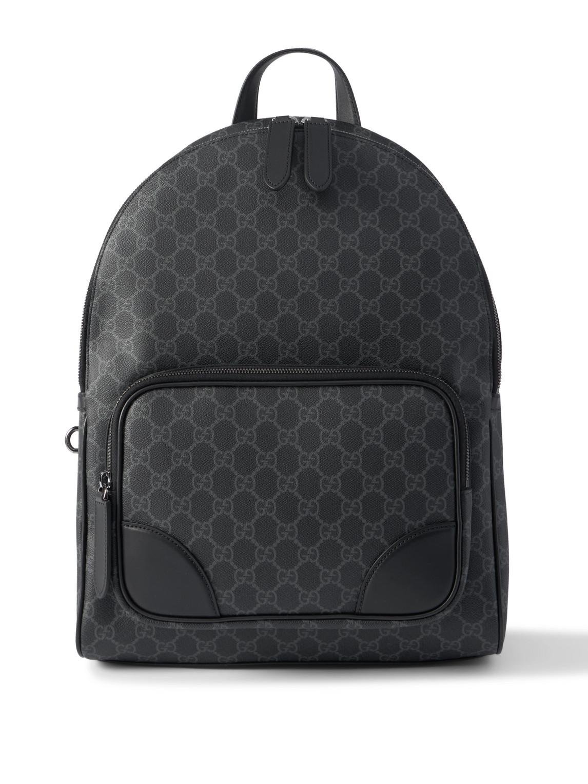 Gucci GG Leather-trimmed Monogrammed Coated-canvas Backpack in Black ...