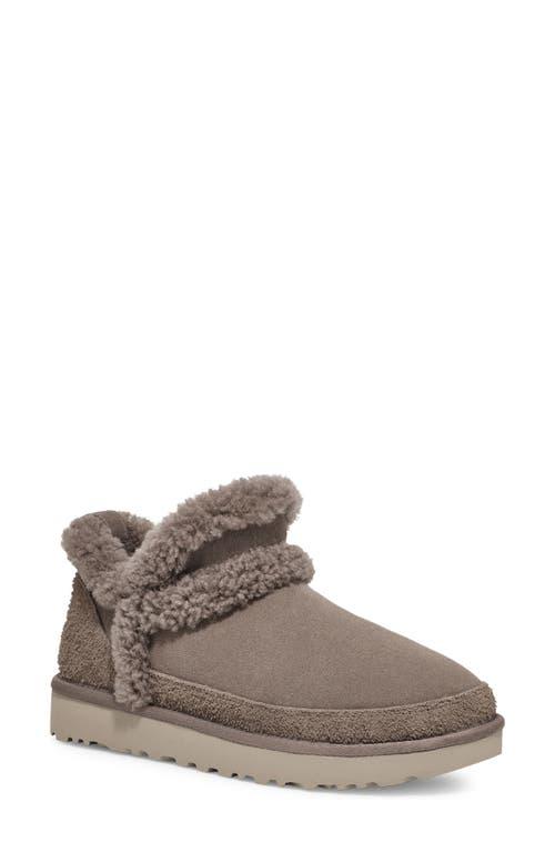 UGG Classic Ultra Mini Spillseam Genuine Shearling Bootie in Brown | Lyst