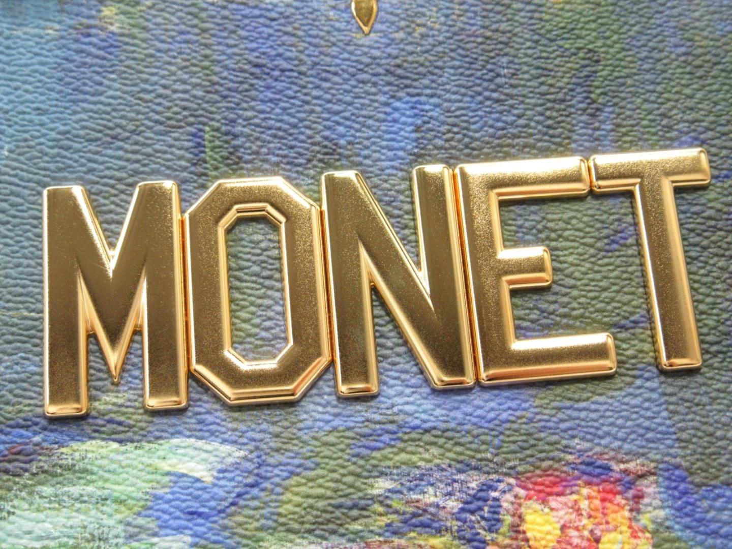 Louis Vuitton Monet Clutch | semashow.com